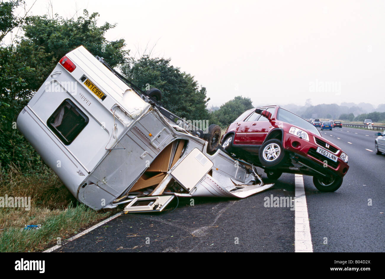 nasty caravan crash on a british motorway Stock Photo - Alamy