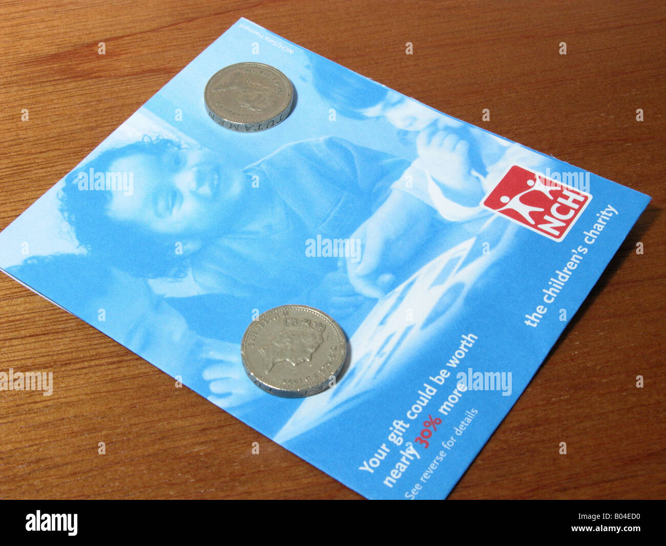 NCH charity collecting envelope with donated money Stock Photo - Alamy
