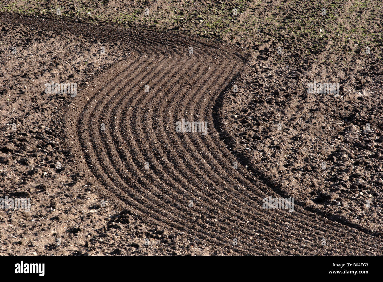 Freshly ploughed and harrowed field Stock Photo - Alamy