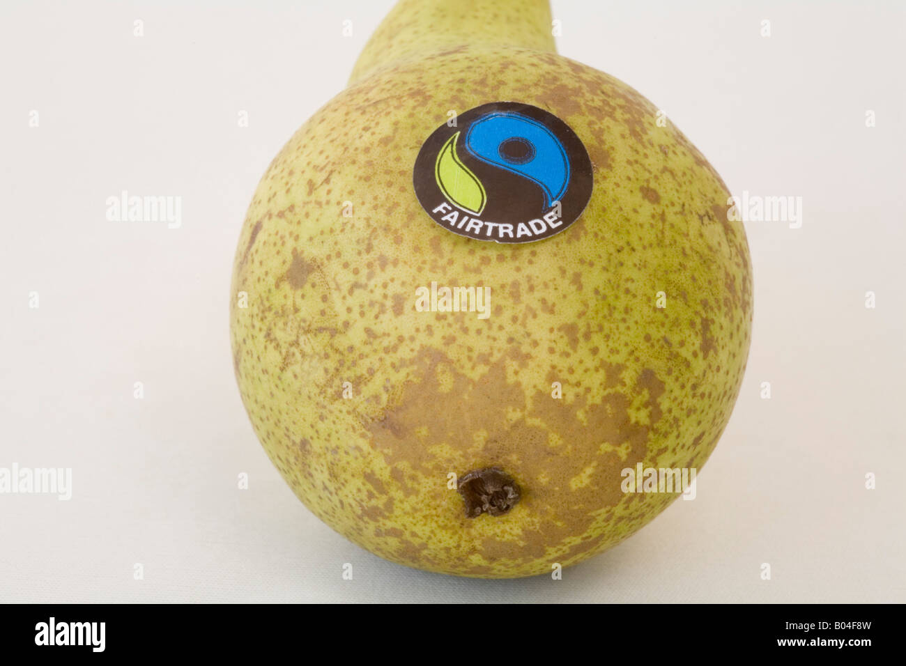 Still Life Studio Close up Fairtrade pear with Fairtrade logo sticker ...