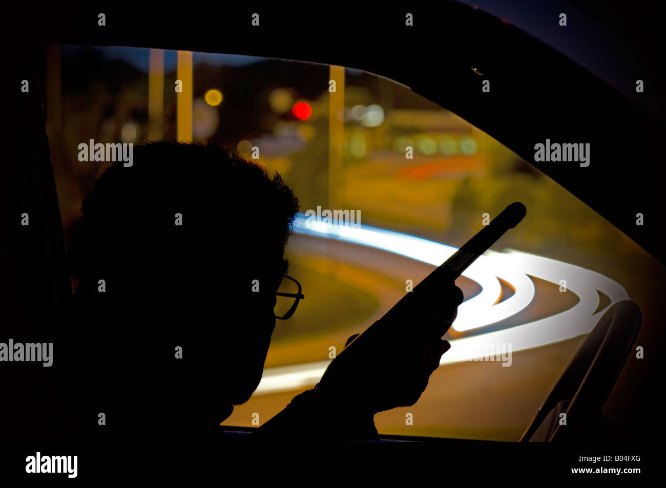 terrorist sniper with rifle parked over busy highway at night Stock ...