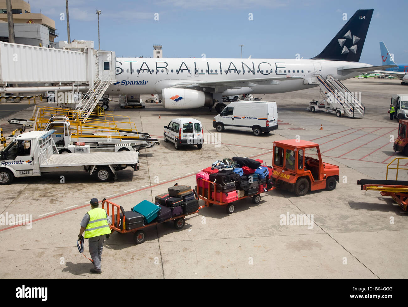 Suitcases and bags transported to aircraft for loading Gran Canaria ...