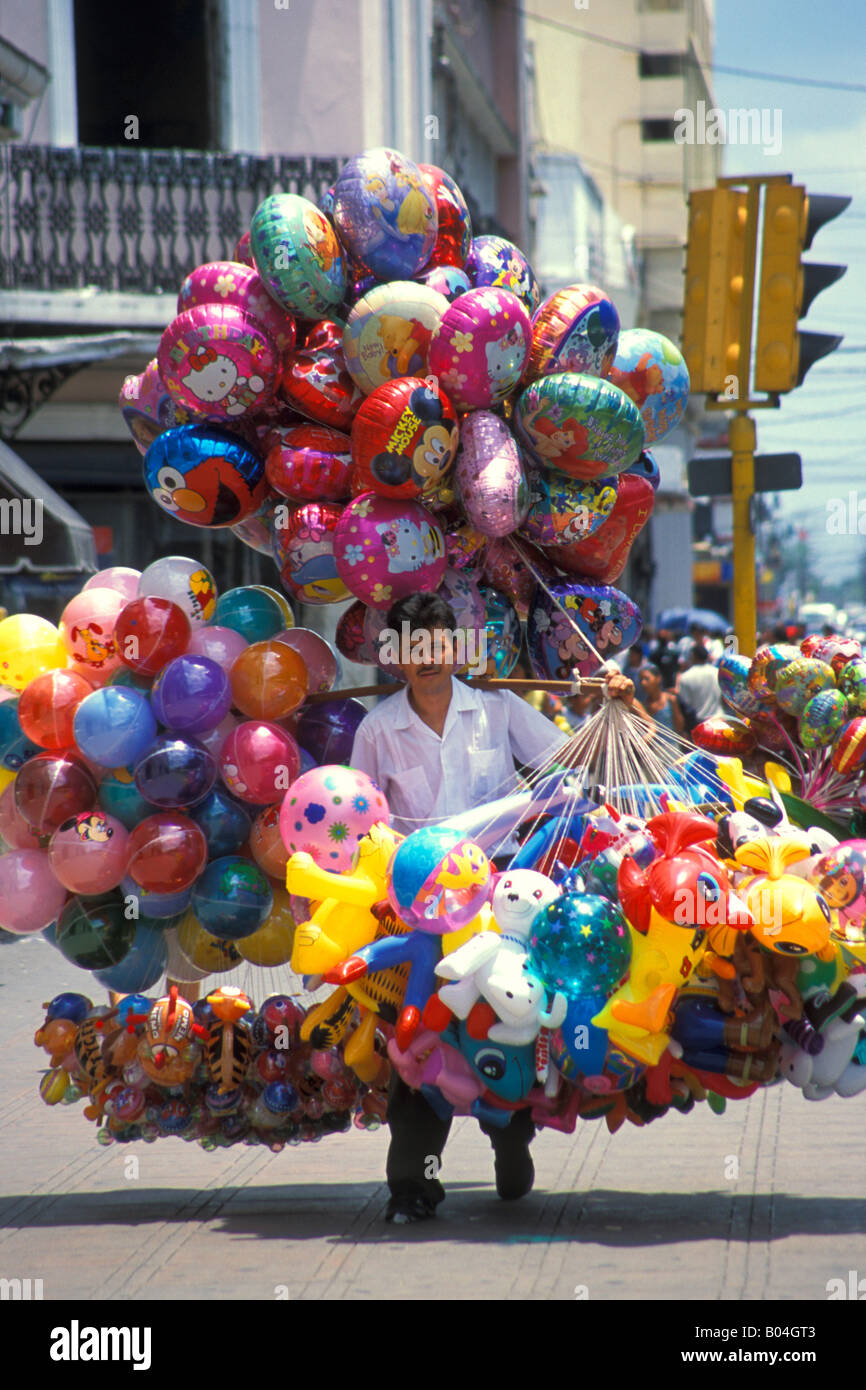 A man peddles balloons near the Plaza Grande in downtown Merida, Mexico ...