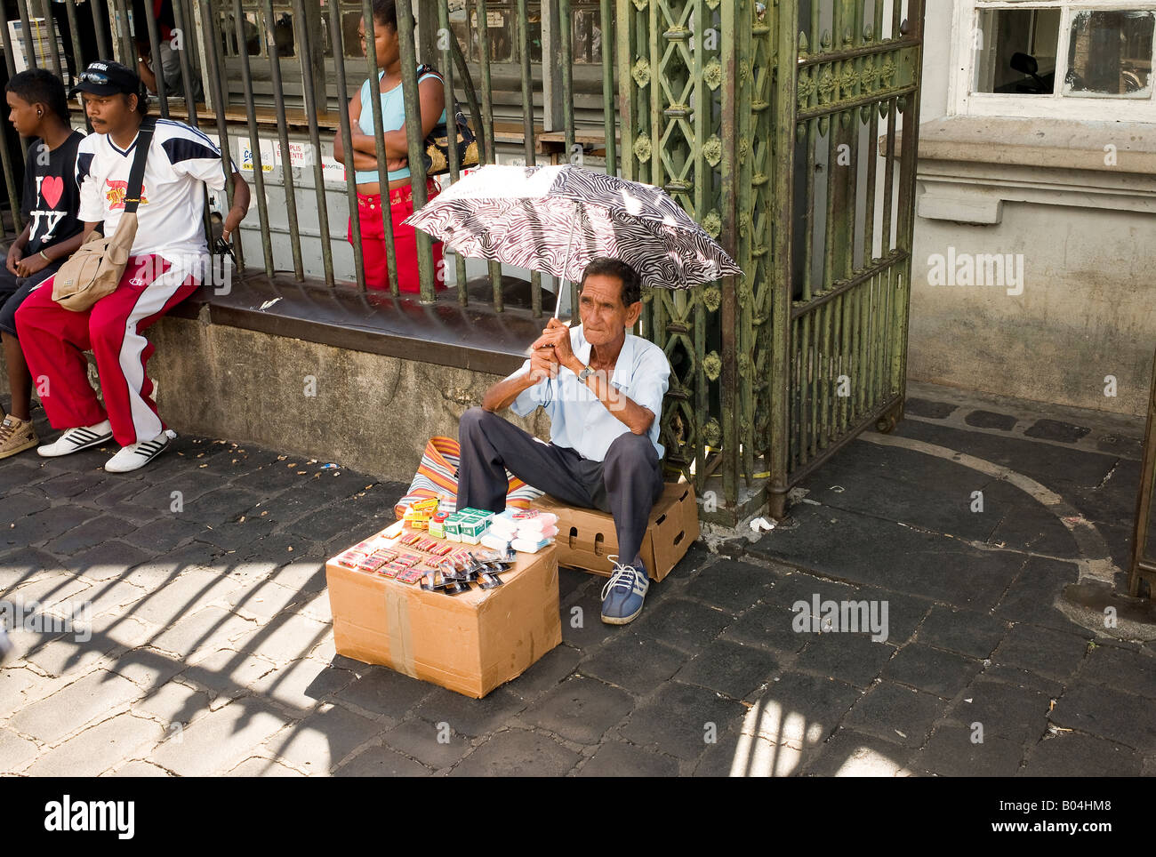 Poor man sells bootlaces in street, Port Louis market, Mauritius Stock ...