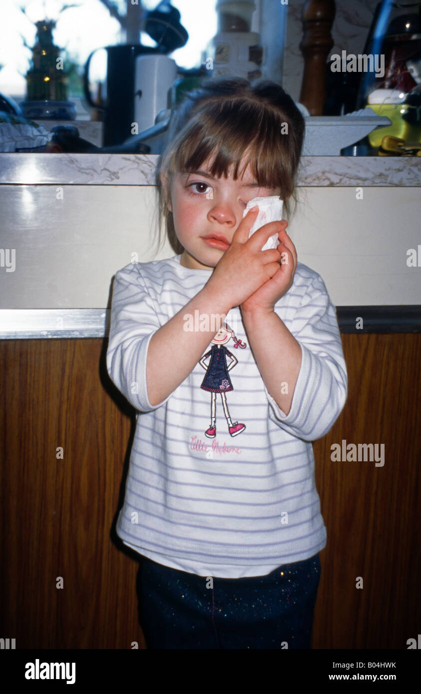 Girl crying wiping eyes hi-res stock photography and images - Alamy