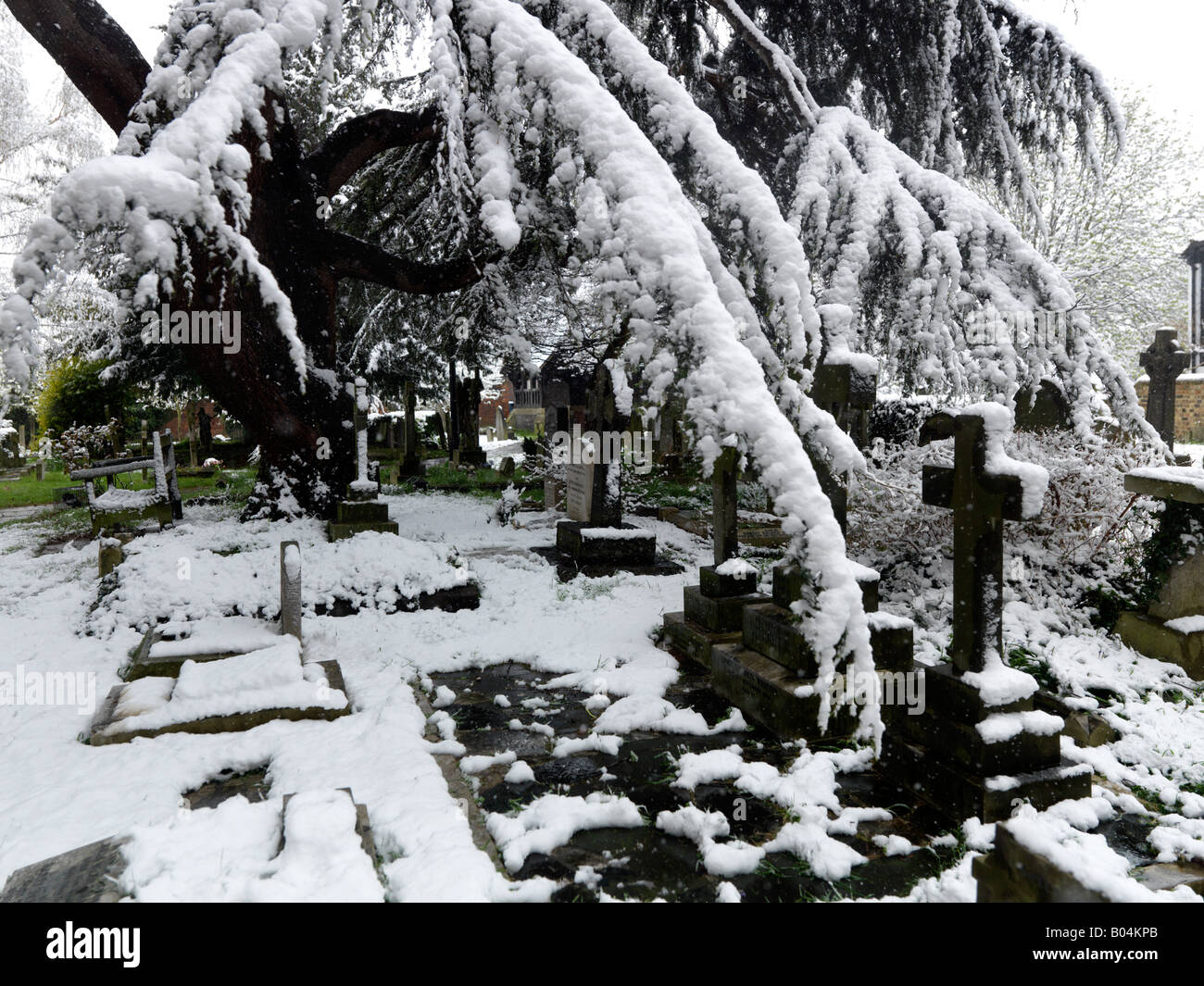 Graveyard snow graves hi-res stock photography and images - Alamy