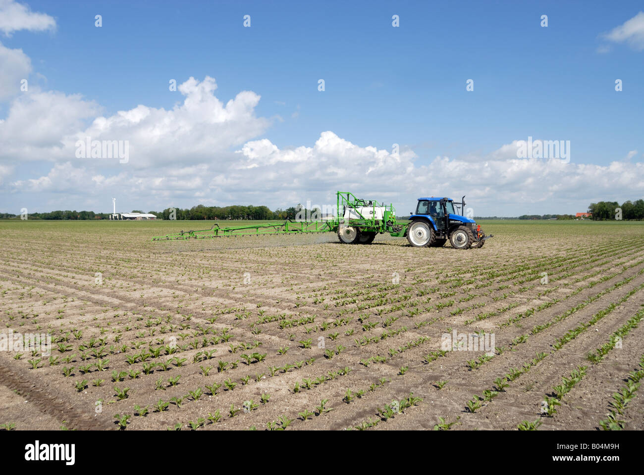 tractor working in field Stock Photo - Alamy