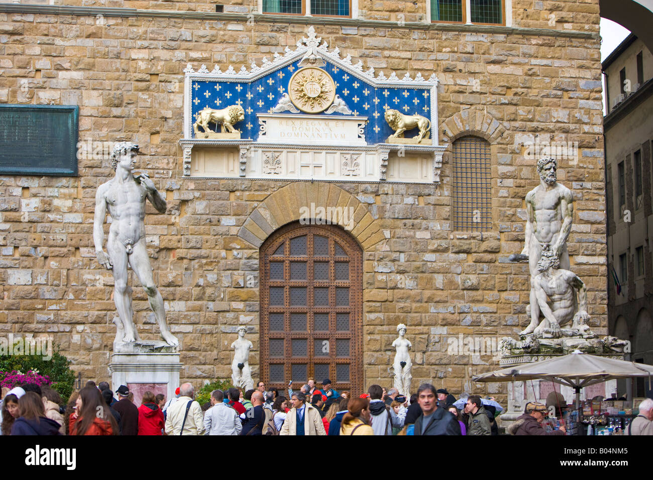 Entrance to Palazzo Vecchio with Republican frieze above, guarded by ...