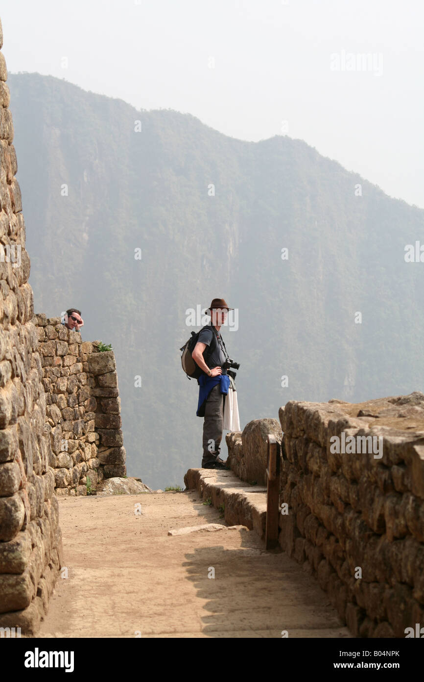 Tourist at Machu Picchu Peru Stock Photo - Alamy