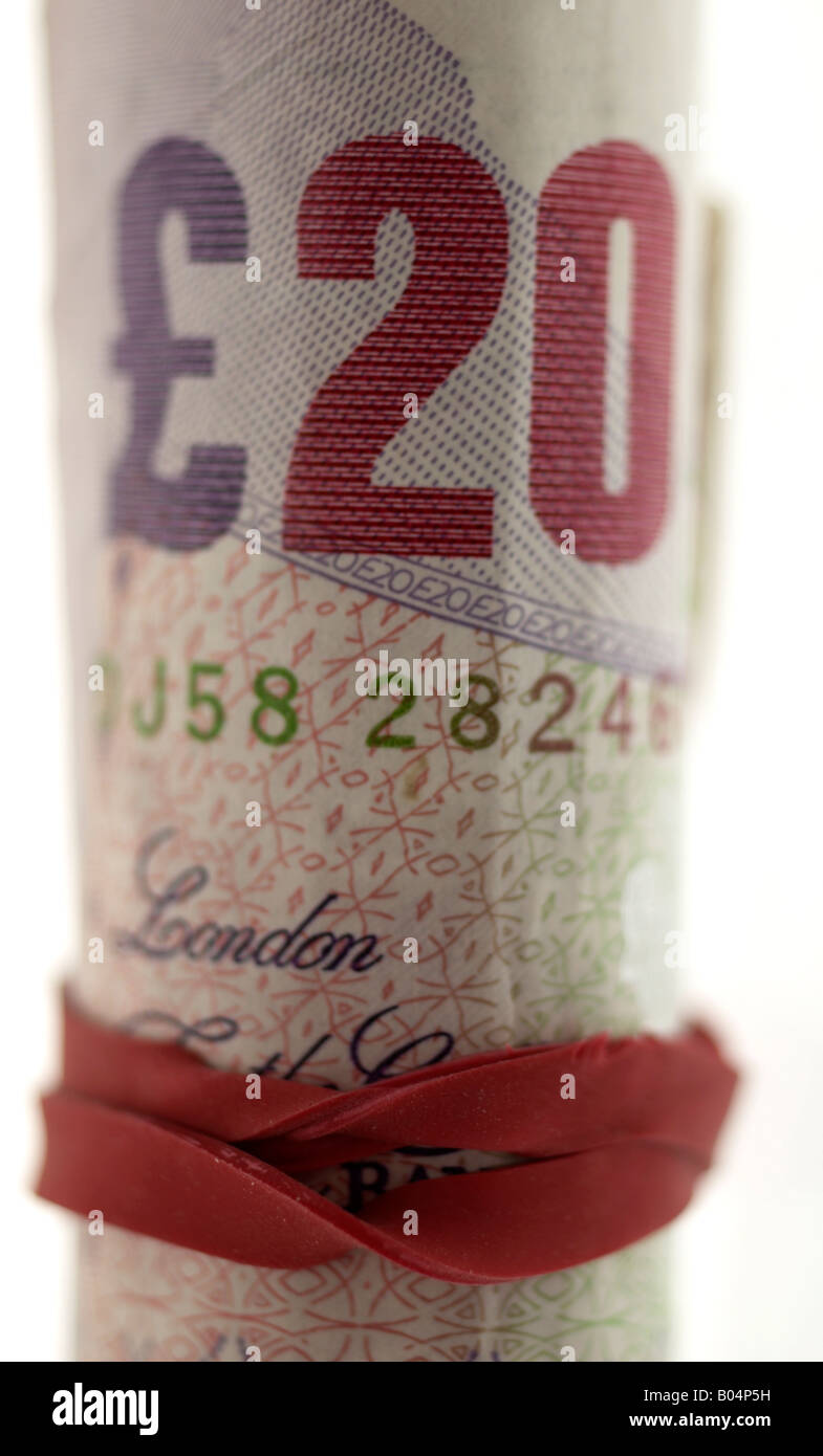 Roll used money hi-res stock photography and images - Alamy