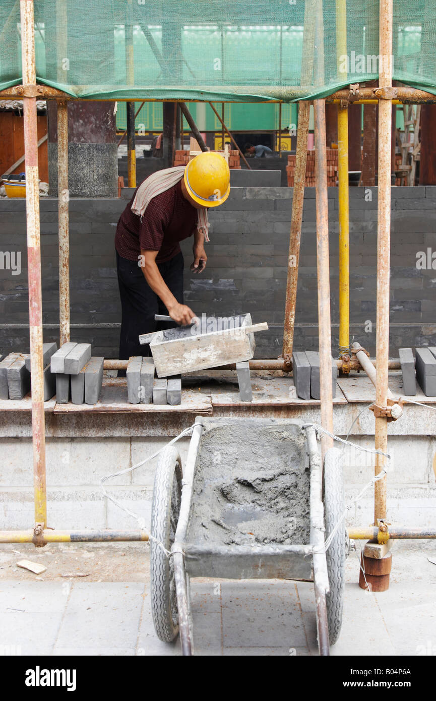 Man Building Wall On Construction Site, Xian, China Stock Photo - Alamy