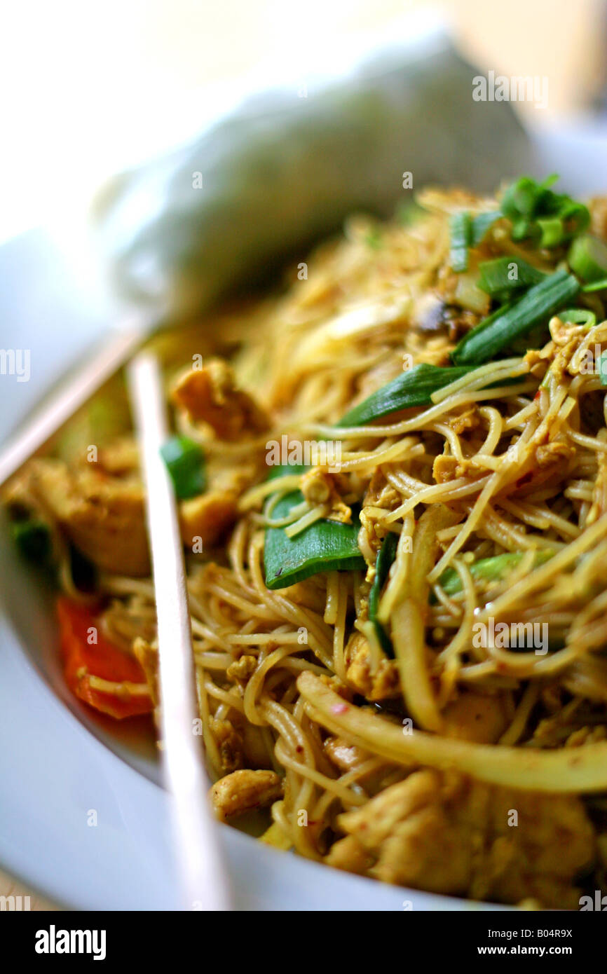 Asain noodles and spring roll on serving plate Stock Photo - Alamy