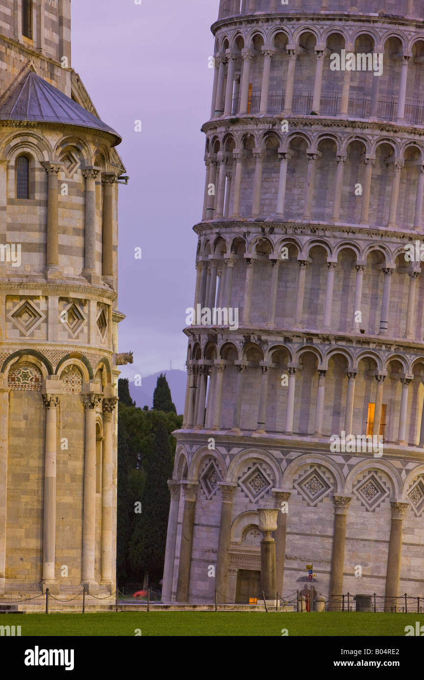 The base of the famous leaning tower of Pisa and Pisa Duomo at dusk in ...