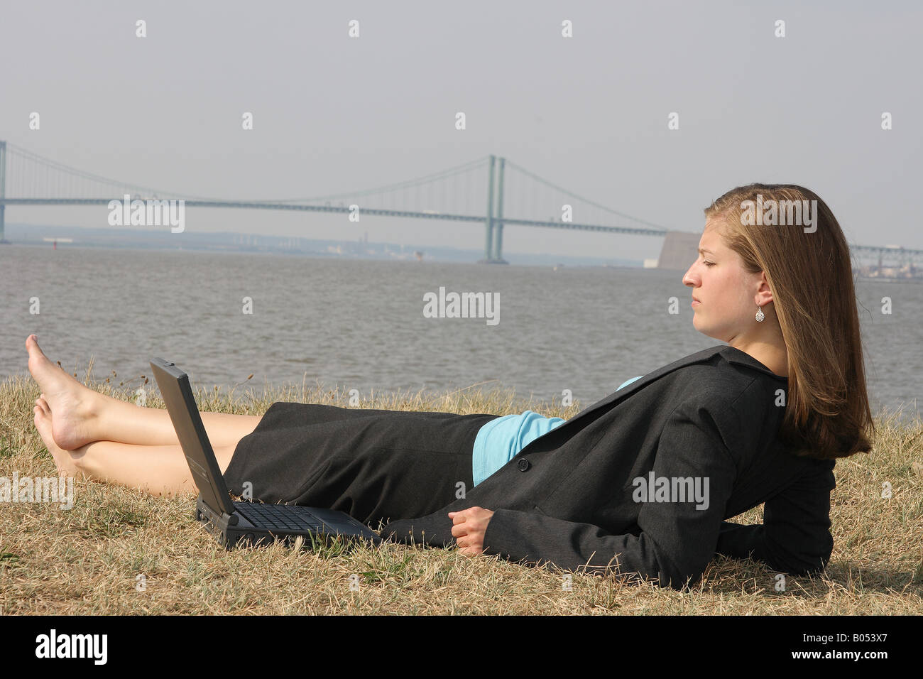 business woman at work by the river Stock Photo - Alamy