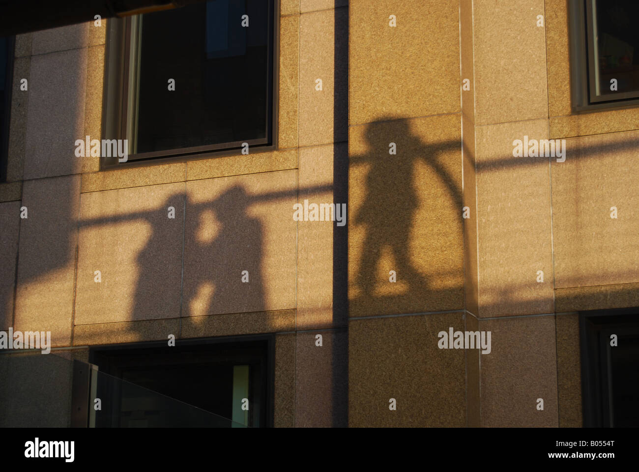 Shadows walking abstract Stock Photo - Alamy