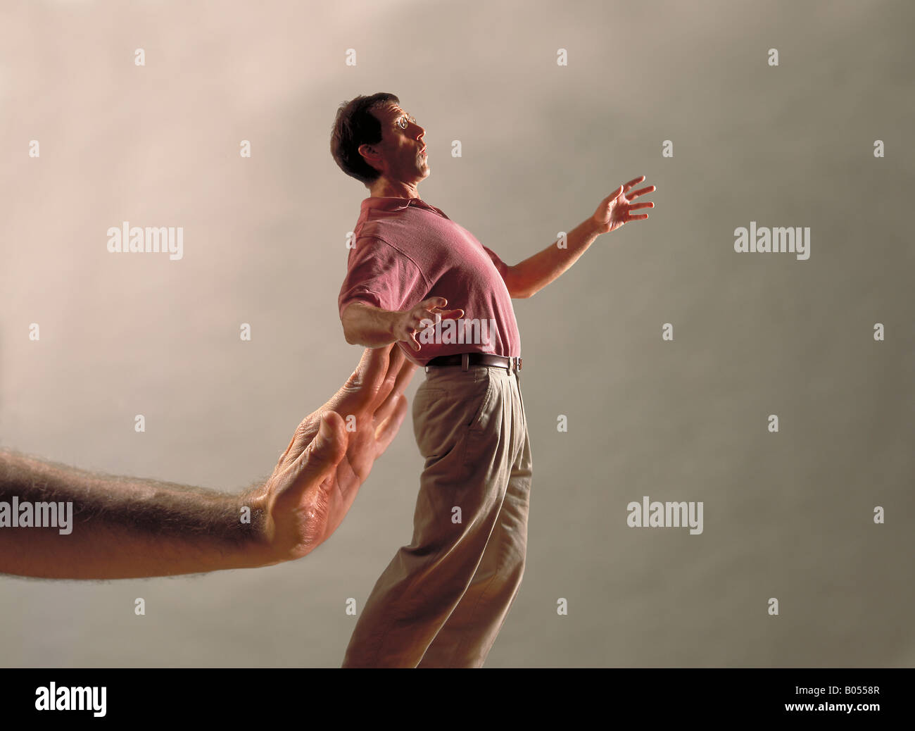 hand pushing man Stock Photo - Alamy
