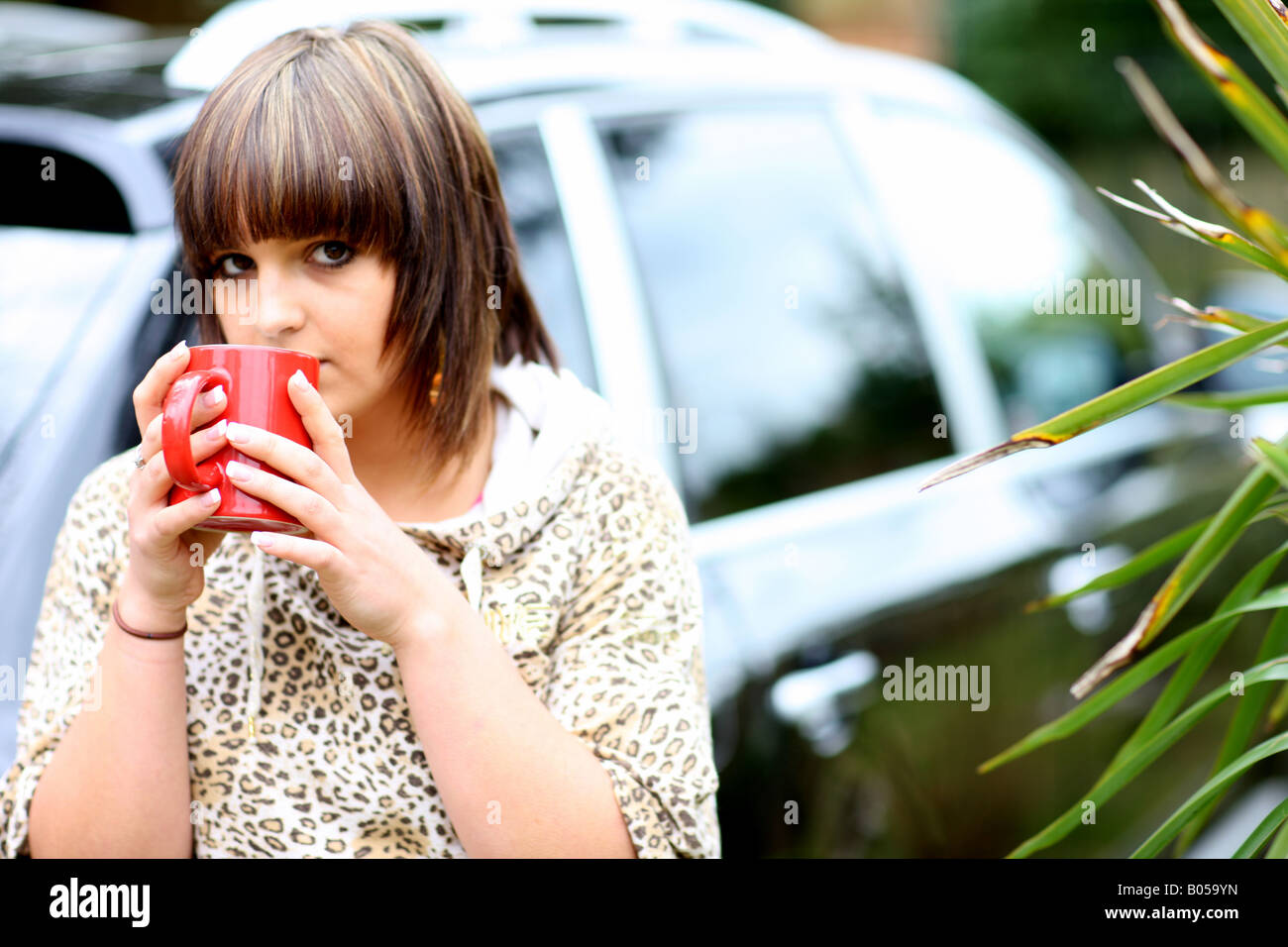 Teenage Girl Drinking Tea Model Released Stock Photo - Alamy