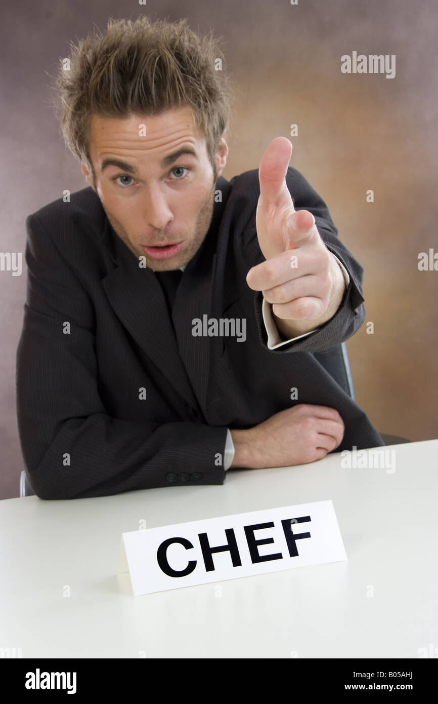 chief at desktop, taking aim at the camera Stock Photo - Alamy