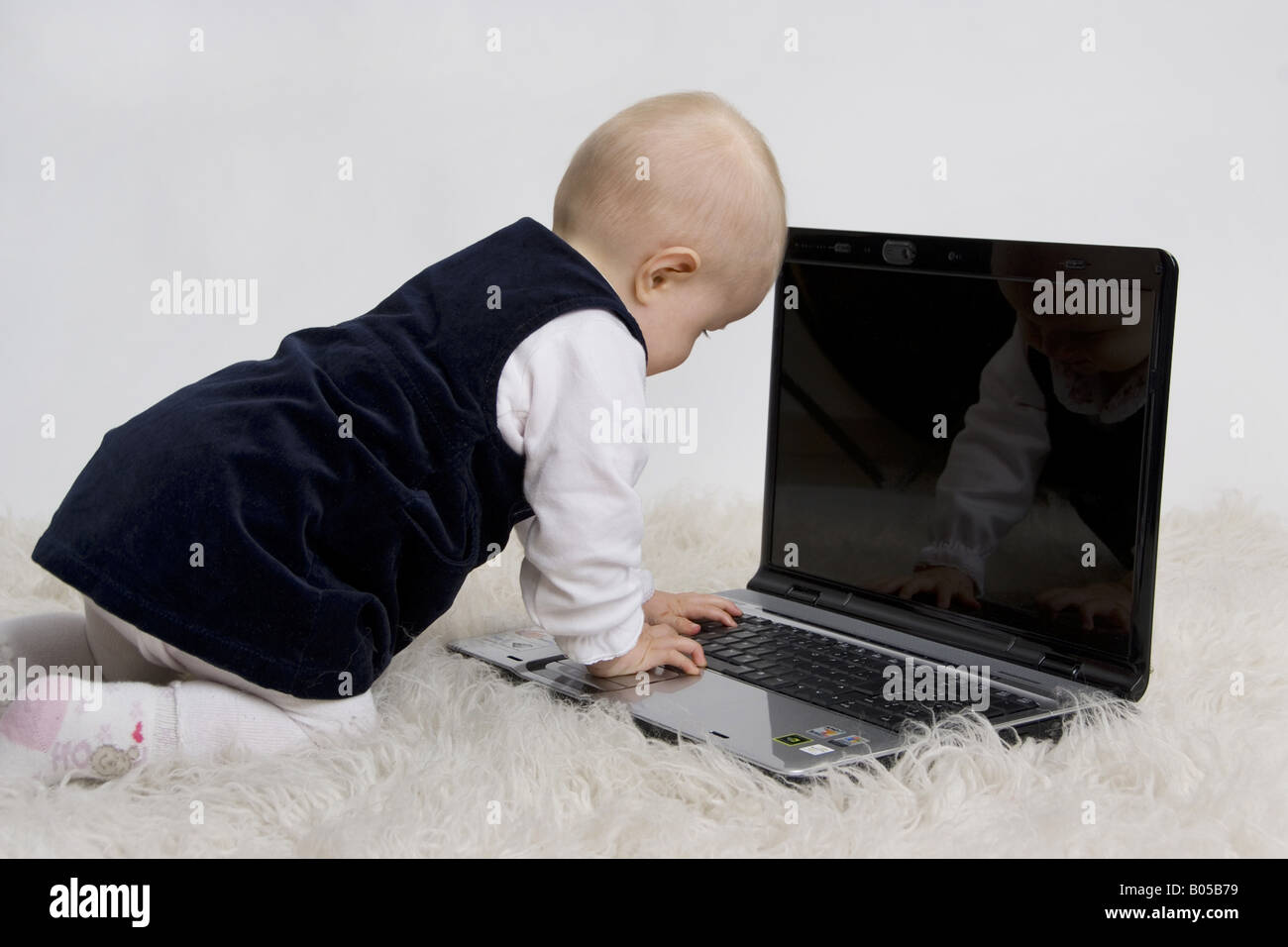 little child using laptop Stock Photo - Alamy