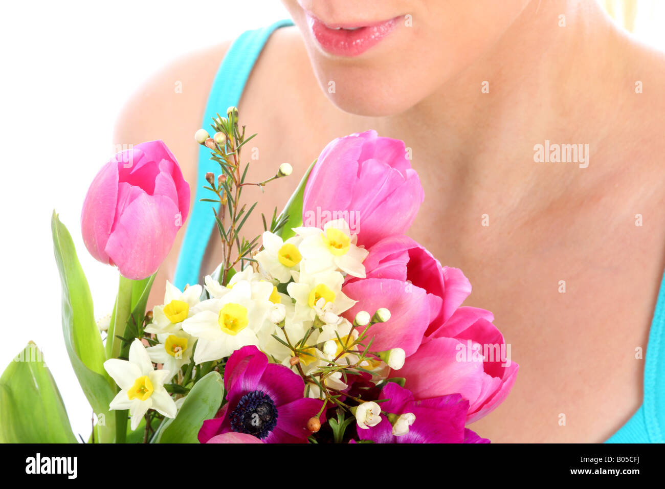 Young Woman Holding A Gift Of A Bouquet Of Beautiful Mixed Cut Flowers ...