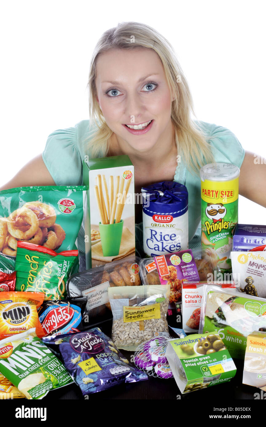 Woman With Snacks Stock Photo - Alamy