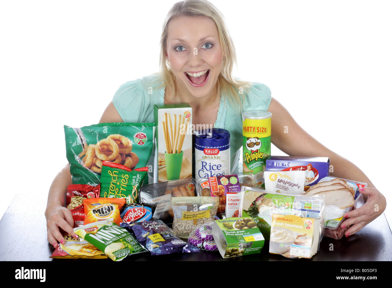 Happy Woman With Snacks Stock Photo - Alamy