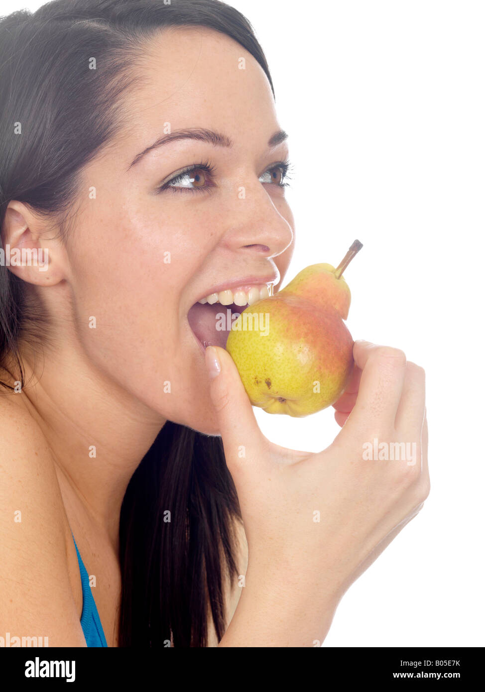 Brunette woman eating fruits hi-res stock photography and images - Alamy