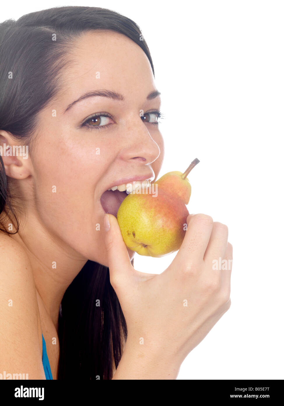 Young Woman Eating A Pear Model Released Stock Photo - Alamy