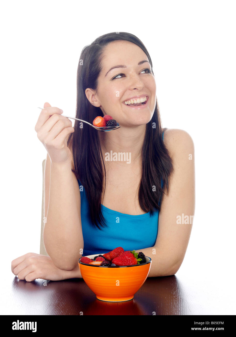 Young Woman Eating Mixed Berries Model Released Stock Photo - Alamy