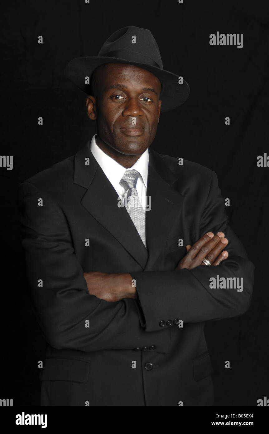 Half body portrait of a mid adult African American businessman in a ...