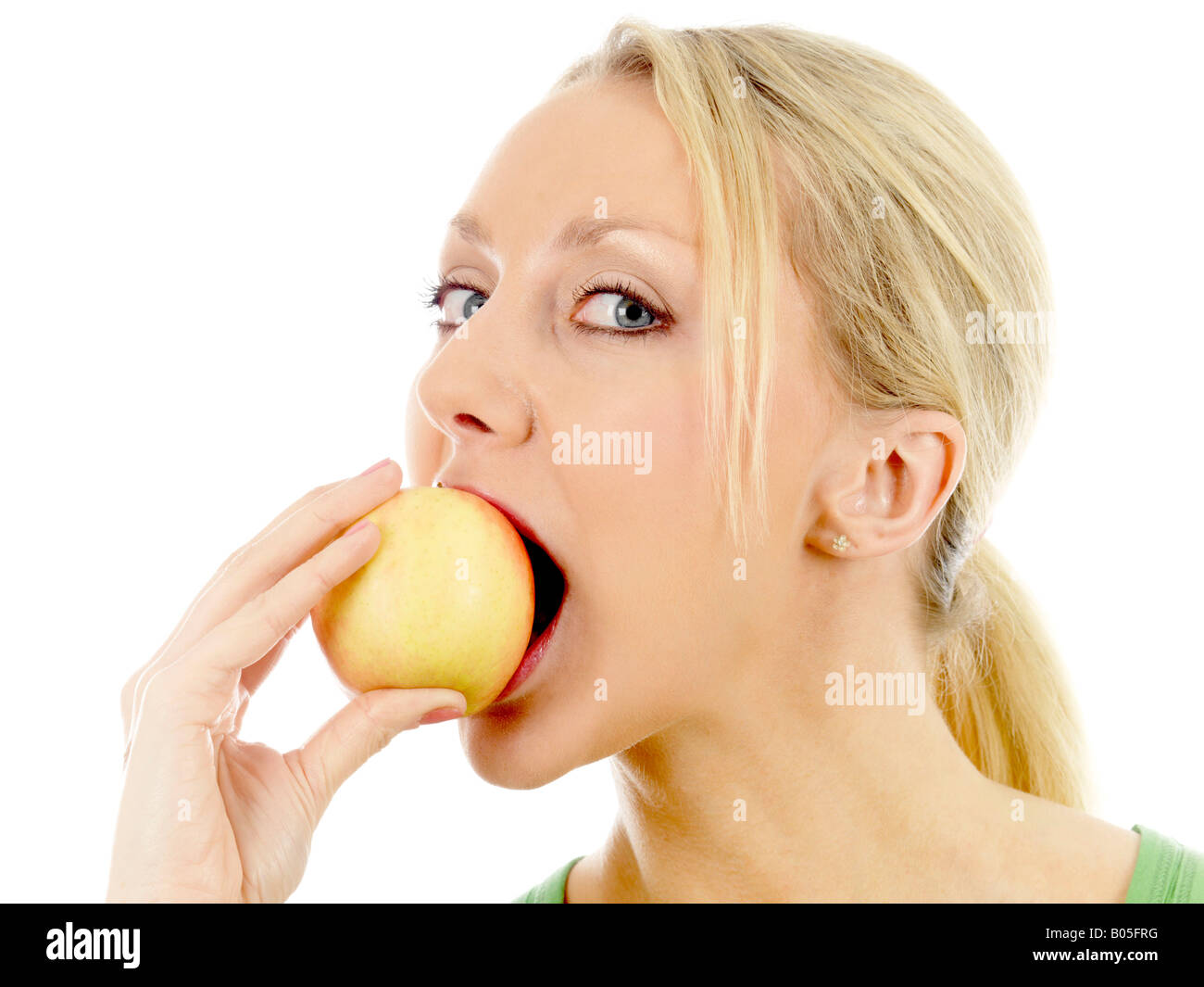 Young Woman Eating an Apple Model Released Stock Photo - Alamy