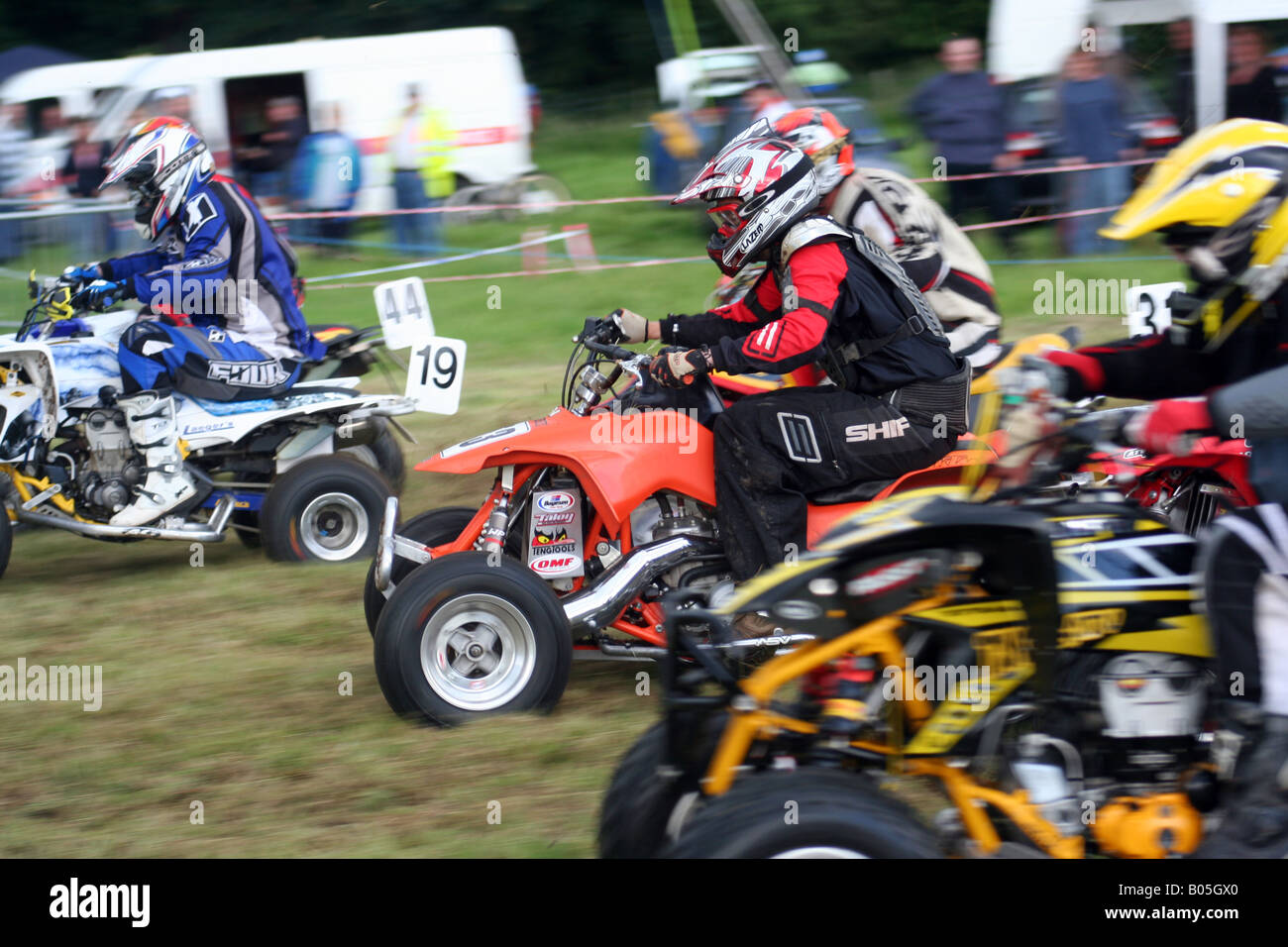 Quad bikes at the start of a grass track race Stock Photo - Alamy