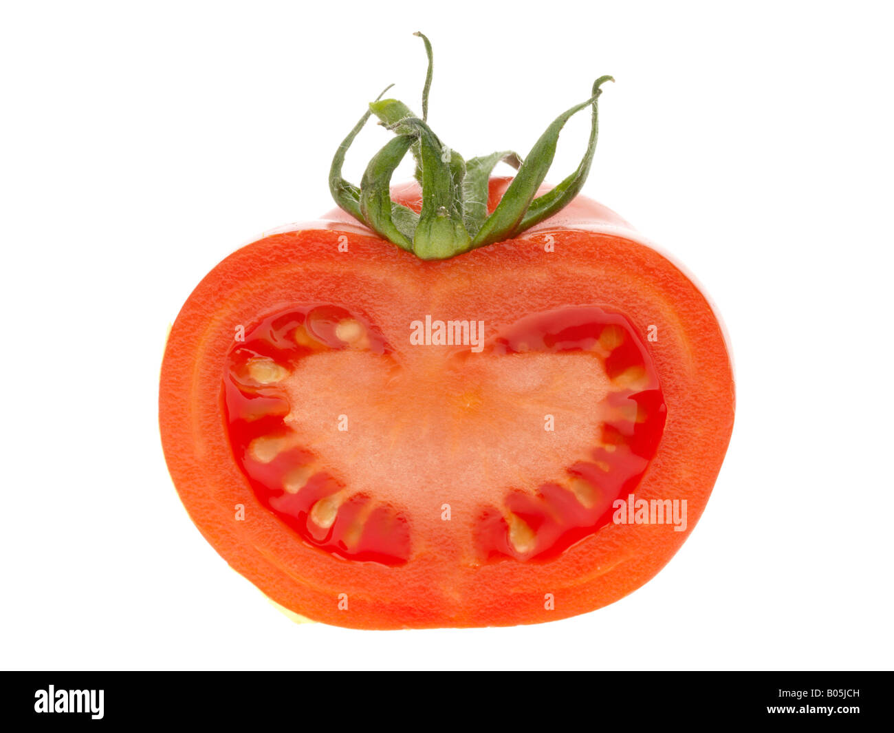 Halved tomato hi-res stock photography and images - Alamy