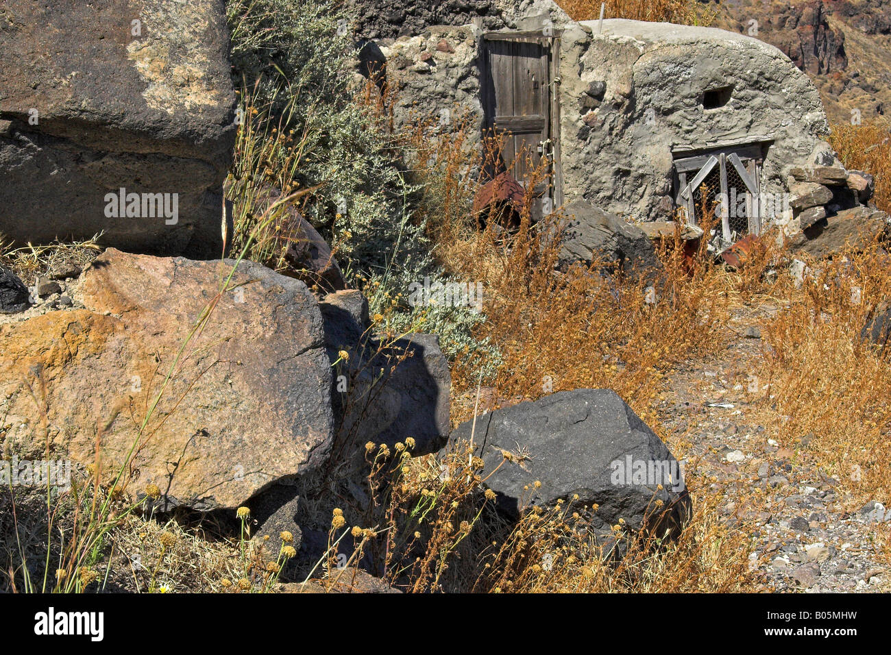 House built in the rock hi-res stock photography and images - Alamy