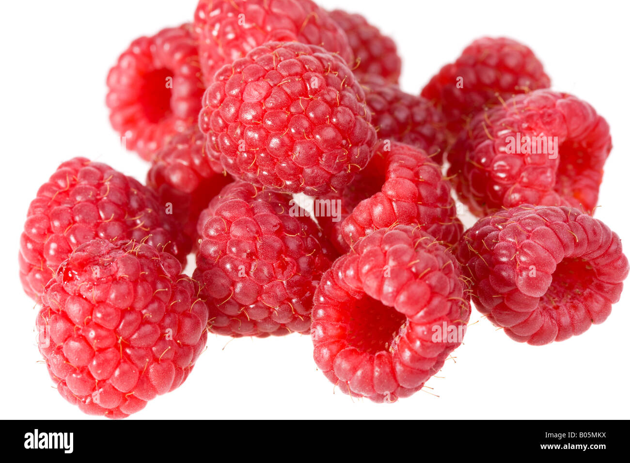 pile of raspberry isolated on a white background Stock Photo - Alamy