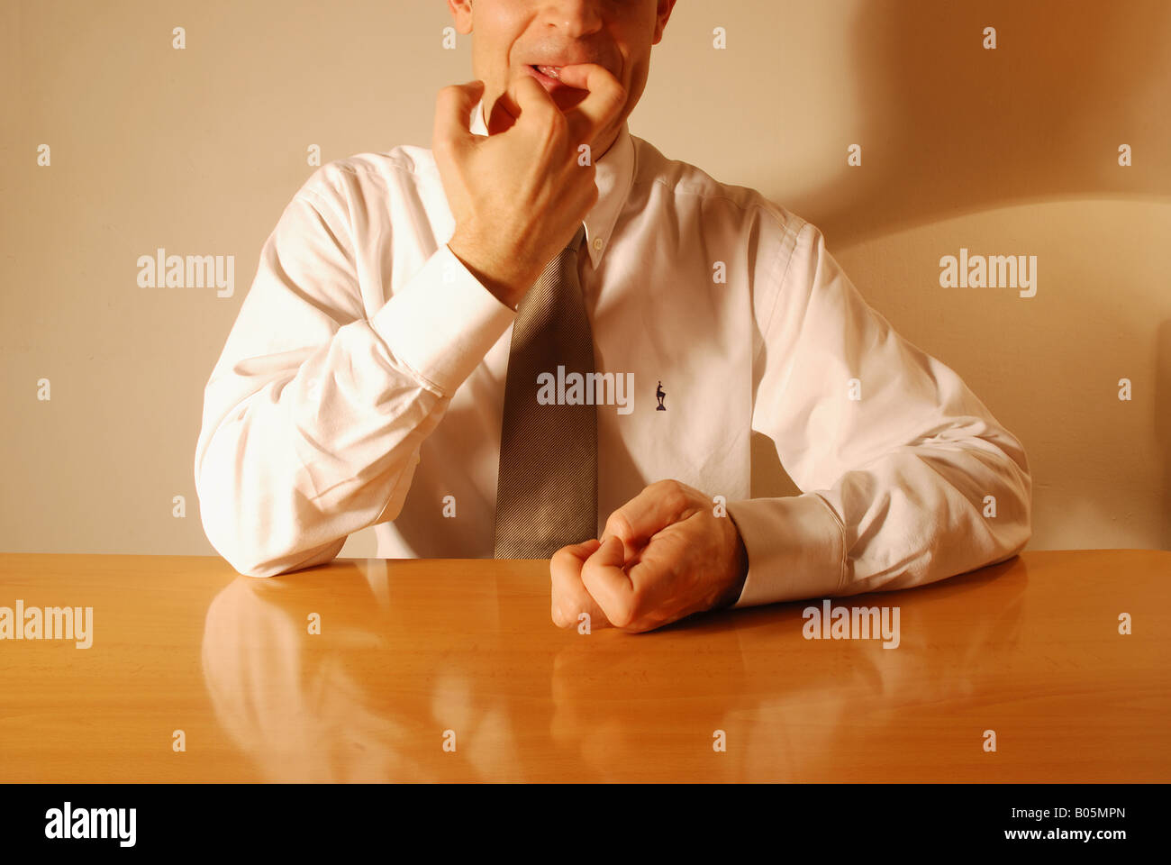 Hand gestures: biting nails Stock Photo - Alamy