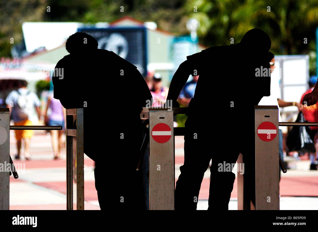 Guards standing post at gate in St. Thomas Stock Photo - Alamy