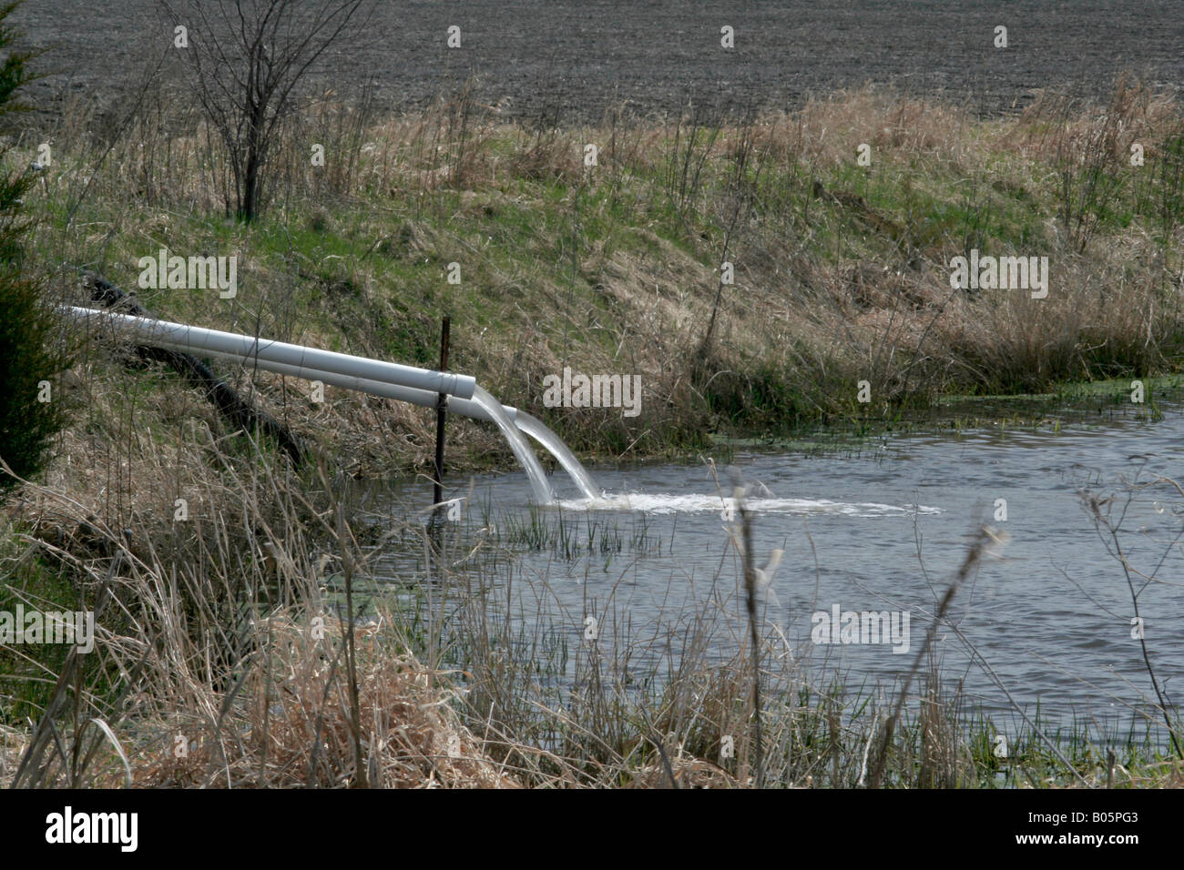 Field drainage pump outlet Stock Photo - Alamy