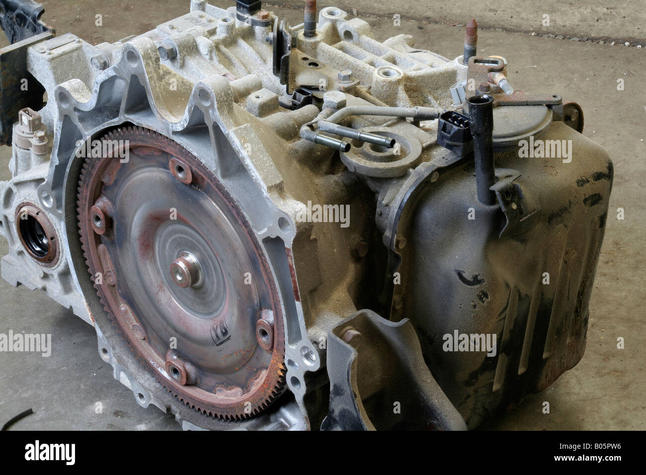 Automobile transmission removed for repair Stock Photo - Alamy