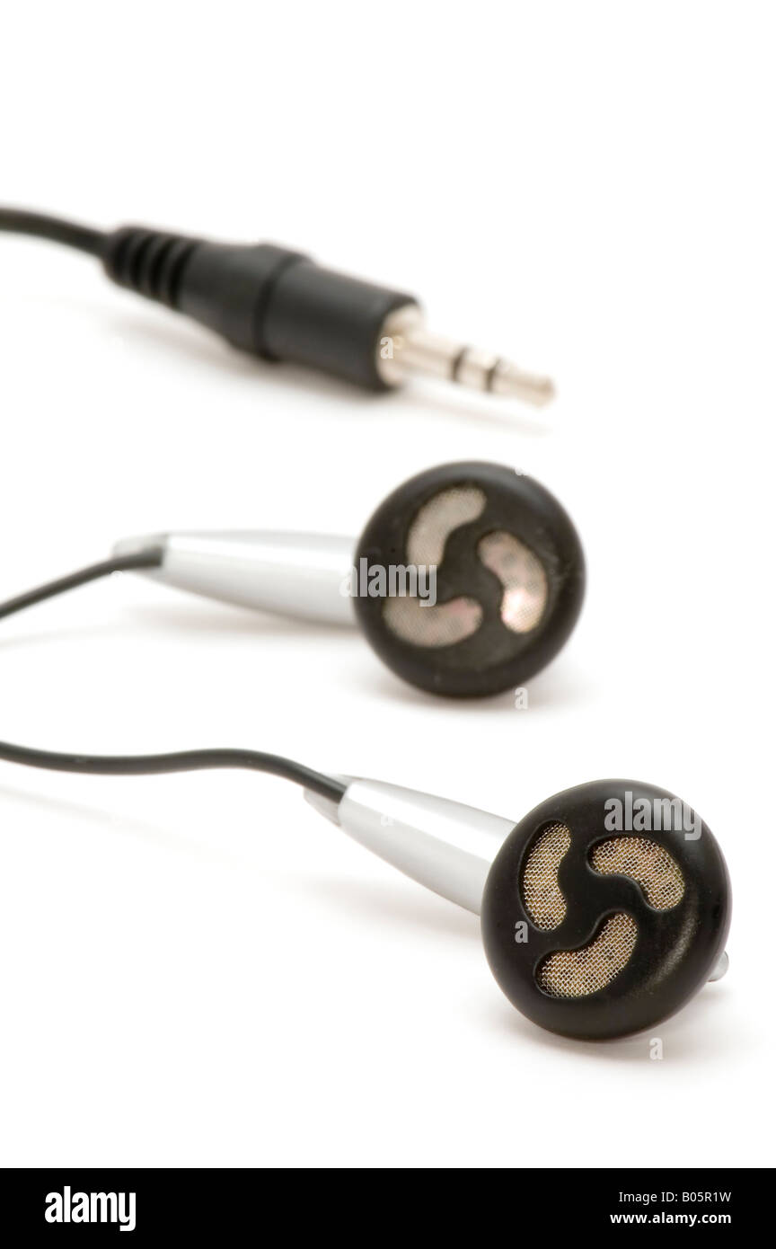 object on white ear phones close up Stock Photo - Alamy