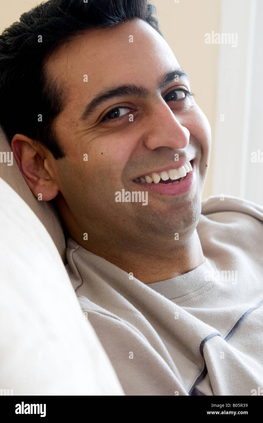 Profile of a laughing east indian man Stock Photo - Alamy