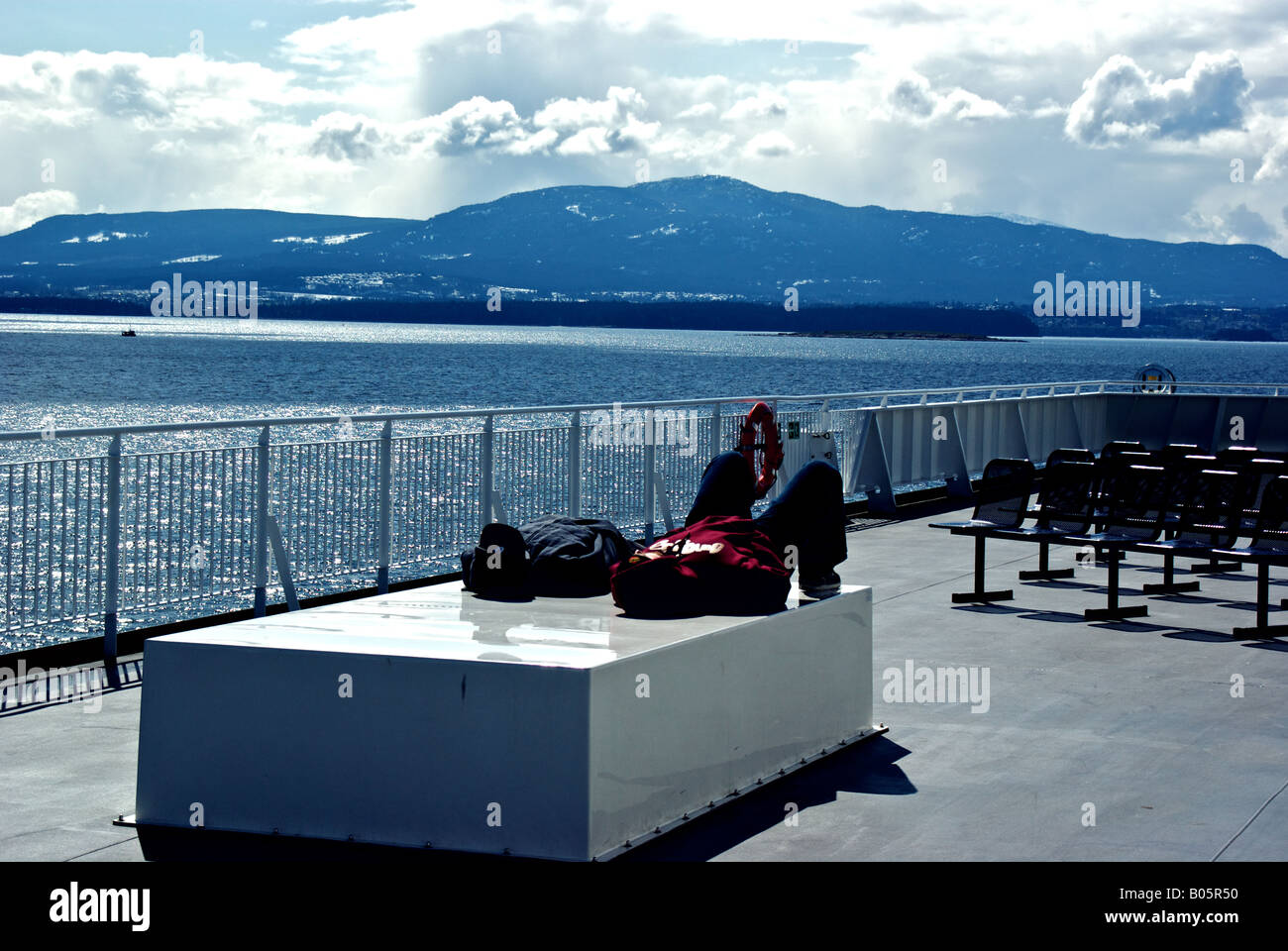 Passengers enjoying the sundeck on Deck 6 while sailing across Georgia ...