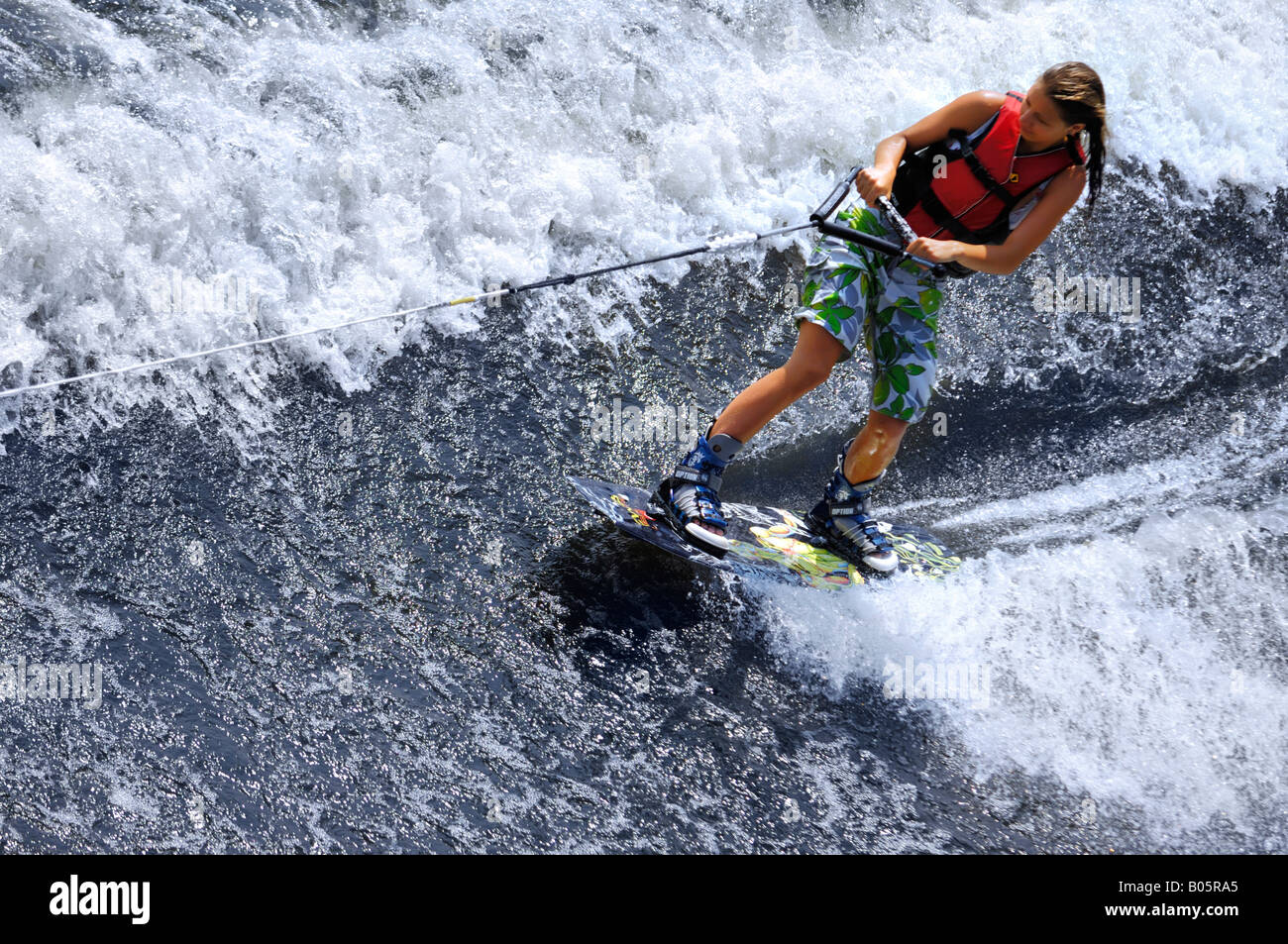 Teenage girl wakeboarder Stock Photo - Alamy