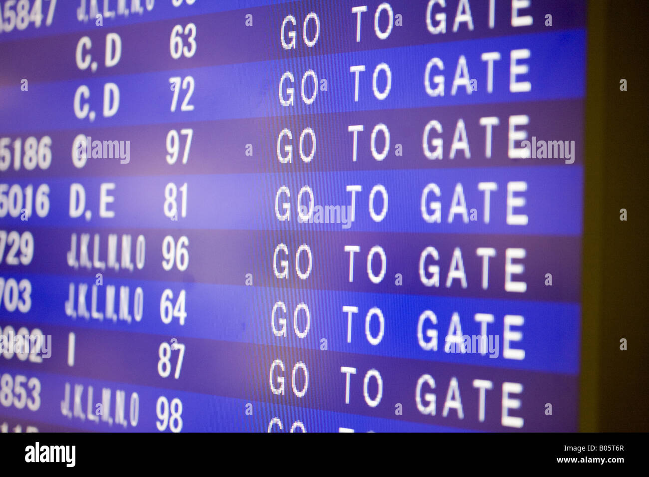 Airport Departure Board Information.Go to gate Stock Photo - Alamy