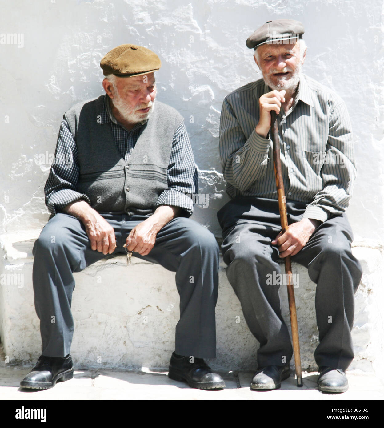 Local Greek gentlemen having morning conversation, Apeiranthos, Naxos ...