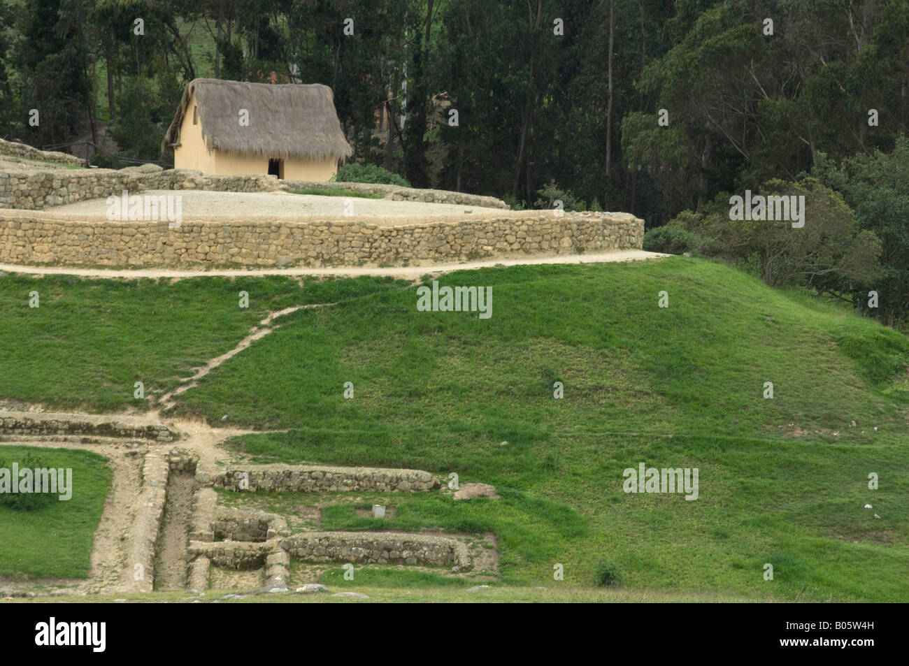 Reconstructed Inca dwelling amid the ruins at Ingapirca in the Andes ...