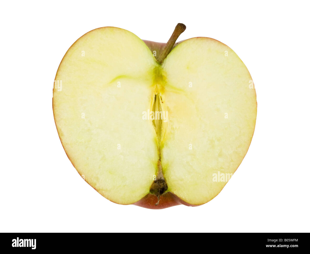 Tasty red apple cut in half isolated on white background Stock Photo - Alamy