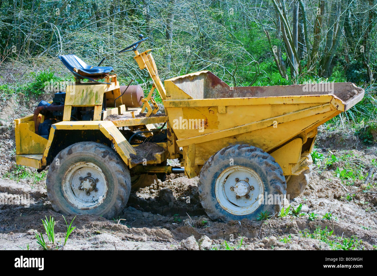 A yellow dumper truck or dump truck View from the front. Close up Stock ...