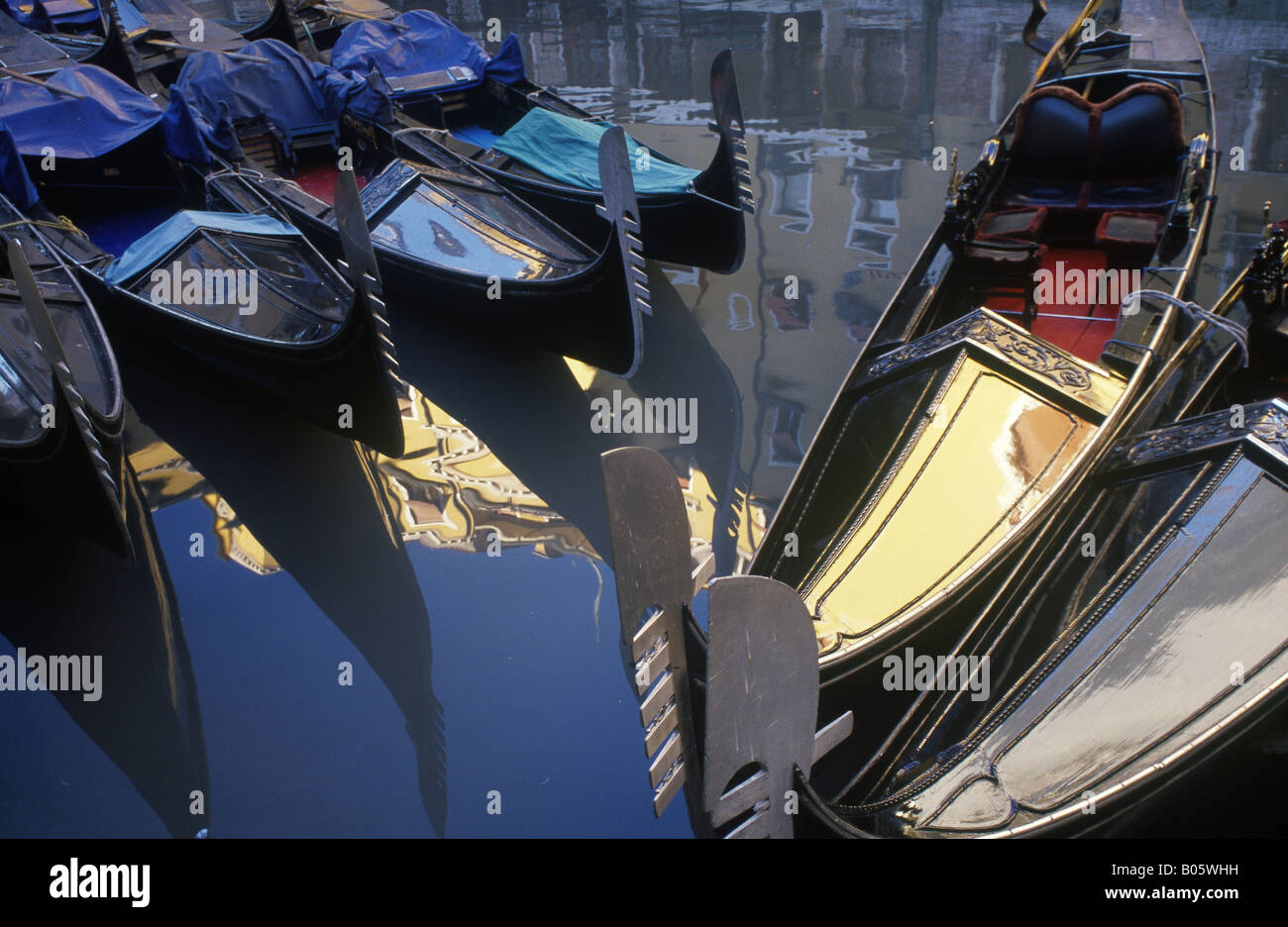 Canal waterway Boats gondolas moored Traditional shape prow Calm water ...