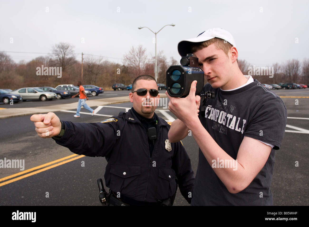 A West Haven Connecticut Police Officer shows students how to use a ...